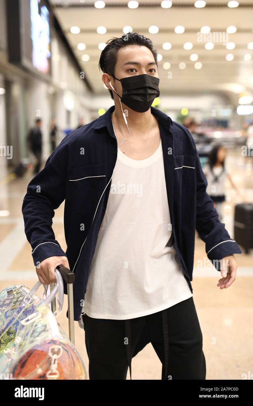 Chinese singer and actor Xu Kai arrives at the Beijing Capital ...