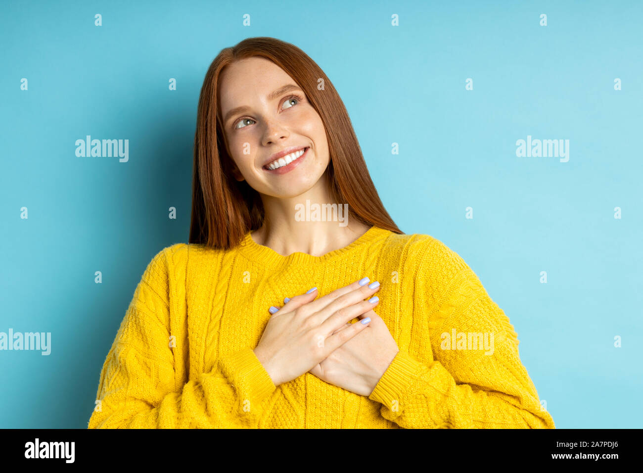 Portrait of beautiful grateful redhead caucasian woman with charming ...