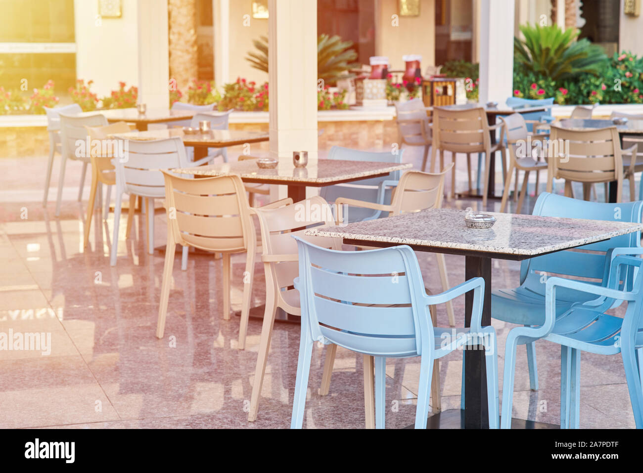 Empty terrace with table and chairs outdoor Stock Photo - Alamy
