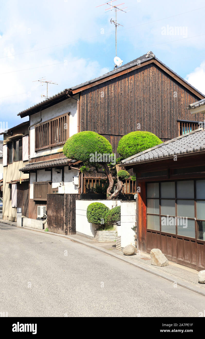 Medieval street with traditional japanese houses and storehouses in ...