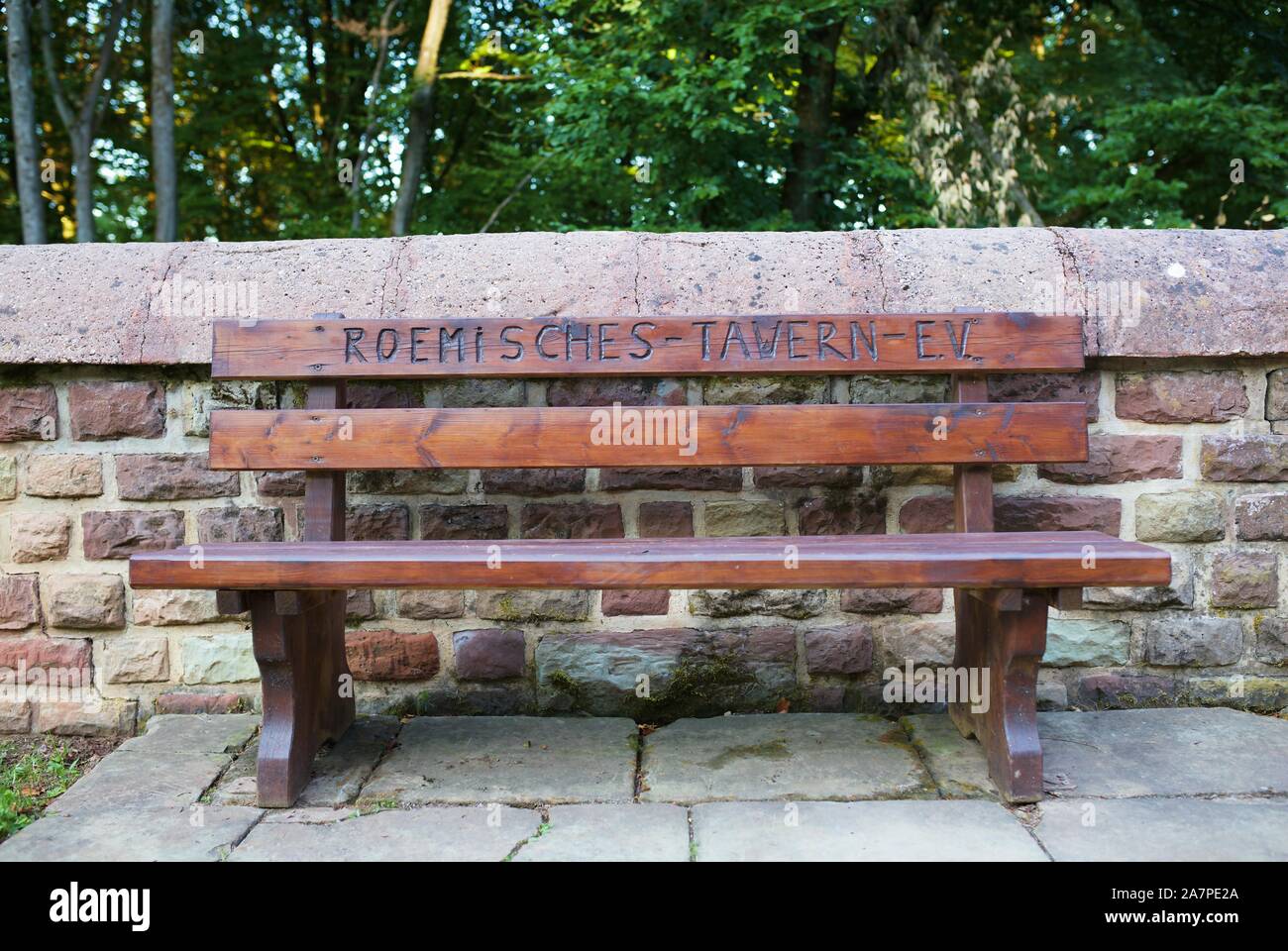 Wooden bench with Inscription Stock Photo - Alamy