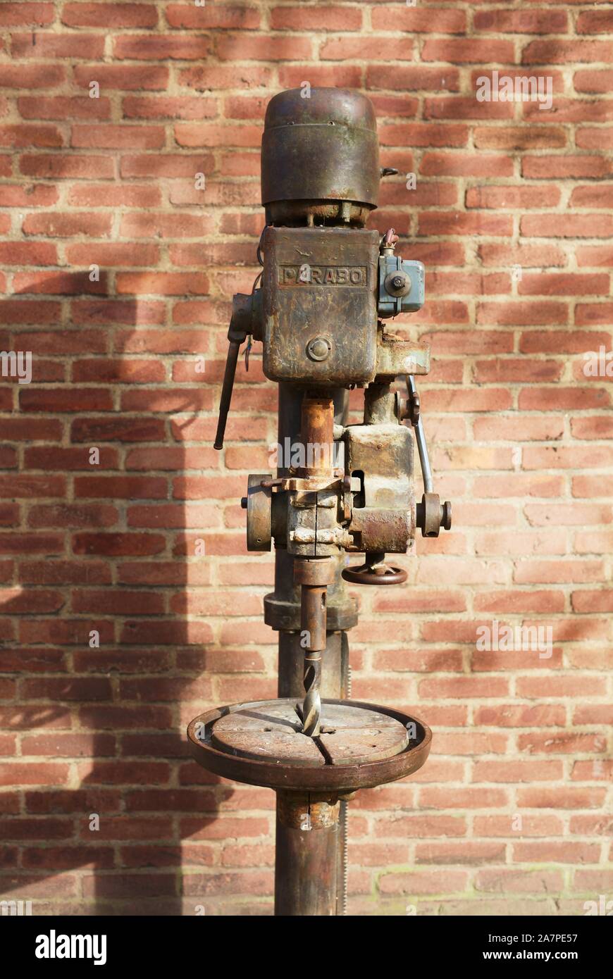 Old industrial vertical drilling rig Stock Photo - Alamy