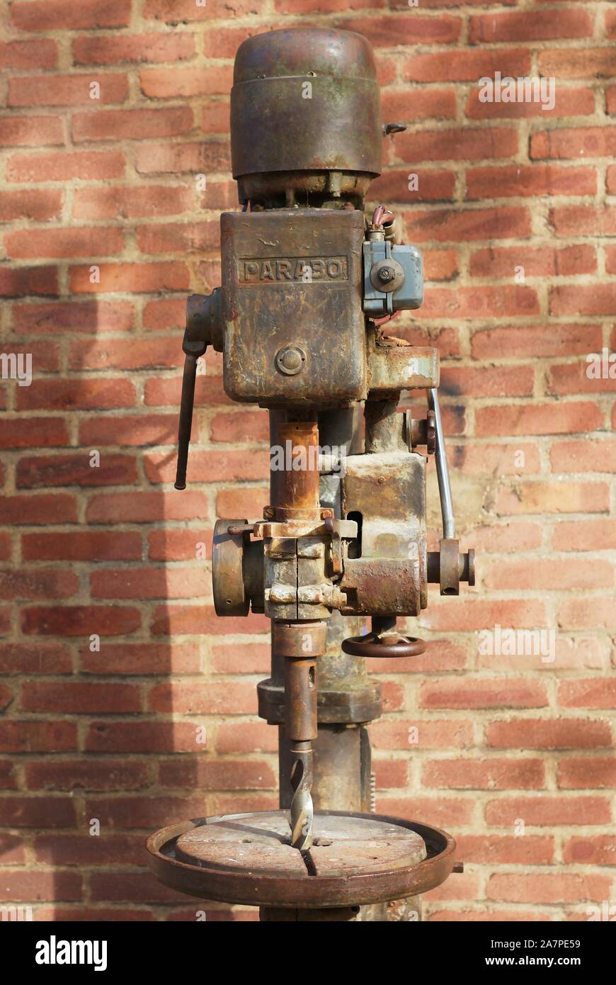 Old industrial vertical drilling rig Stock Photo - Alamy