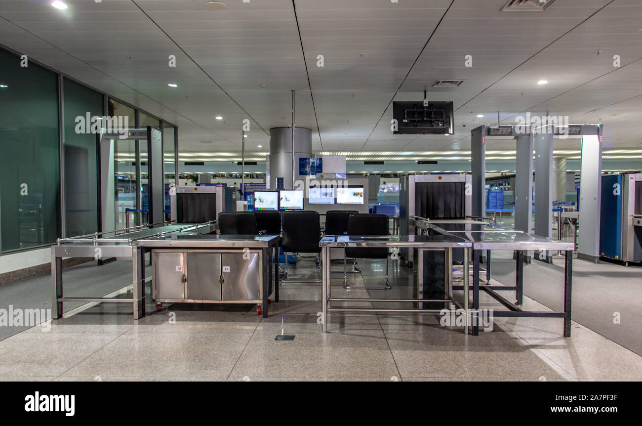 Checkpoint at the airport. X-ray scanner with monitors for detecting ...