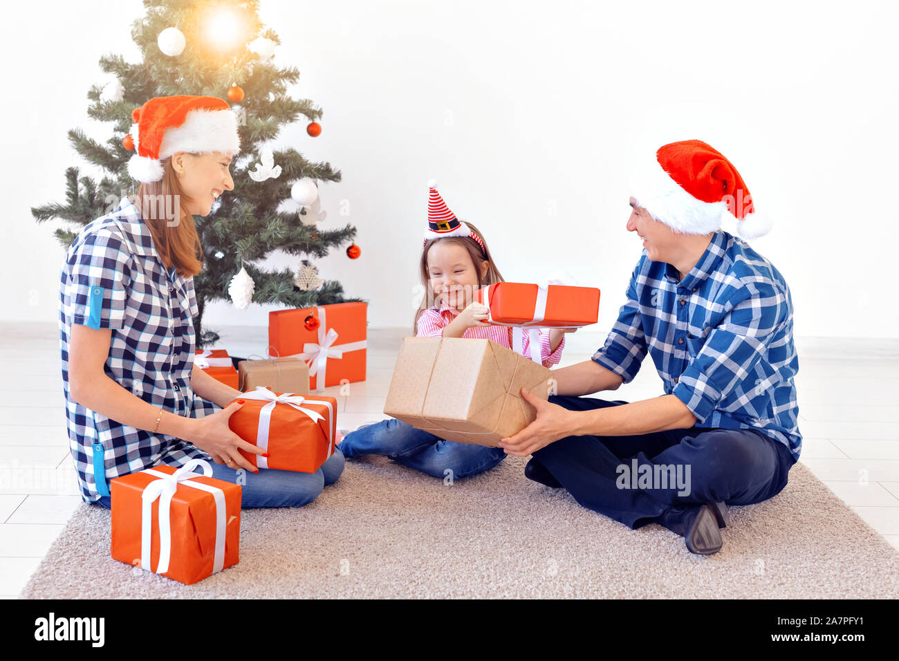 Father opening a xmas present hi-res stock photography and images - Alamy
