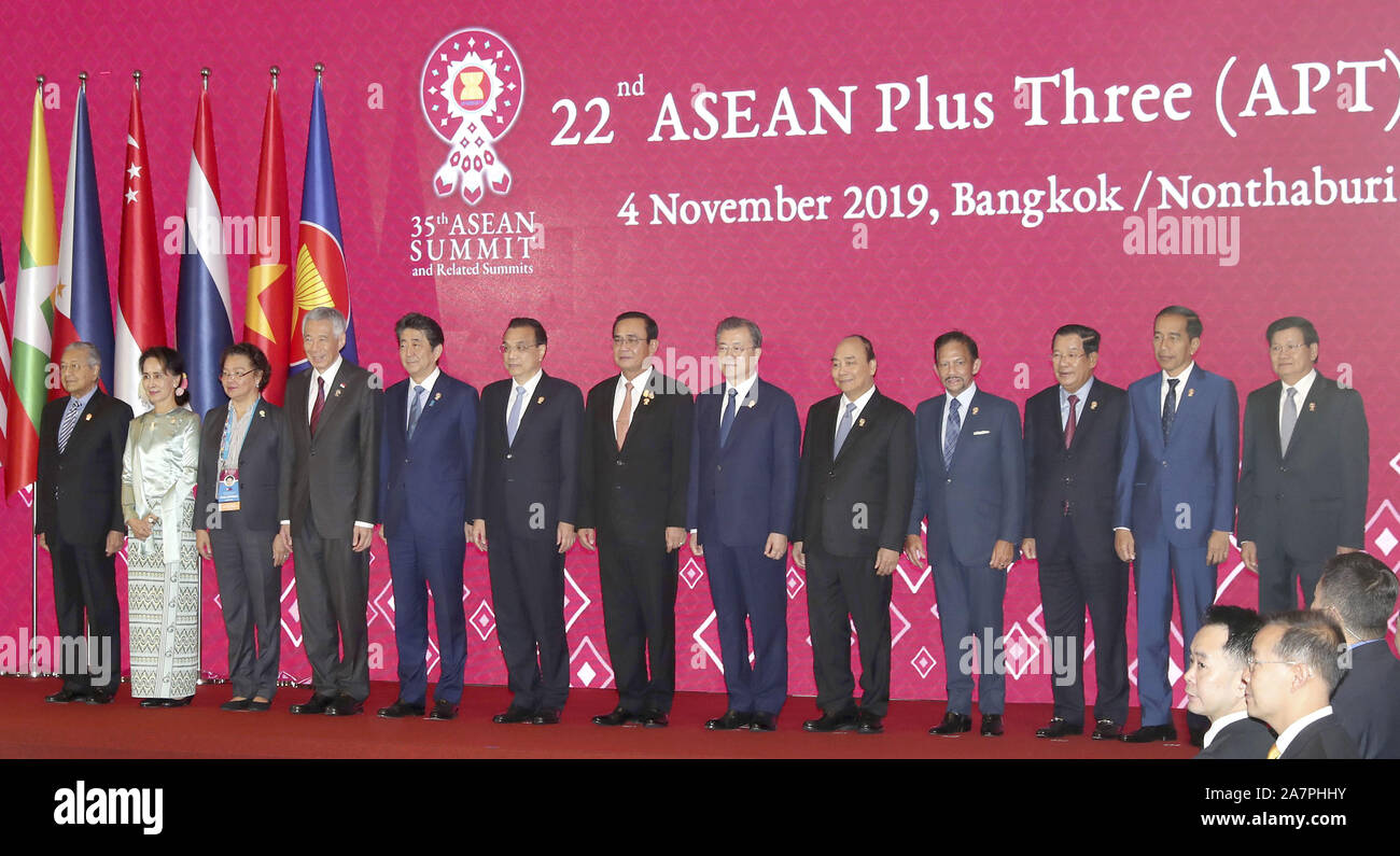 Leaders pose in a photo session for the ASEAN Plus Three summit on Nov ...