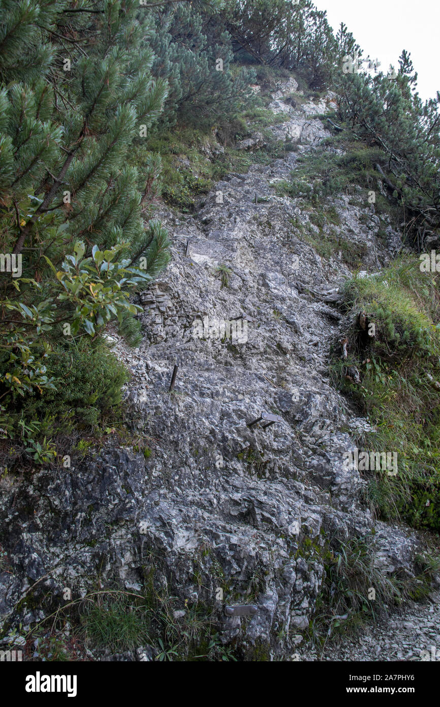Hiking Trail with iron rods to Spik Stock Photo - Alamy
