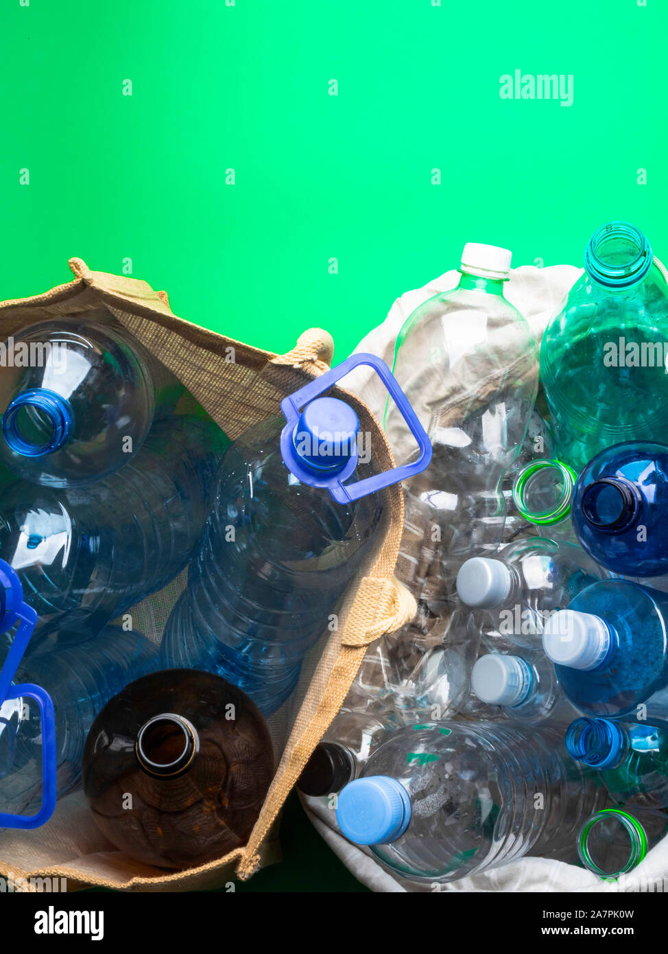 Transparent plastic bottles recycling in eco bag, recycle concept Stock ...