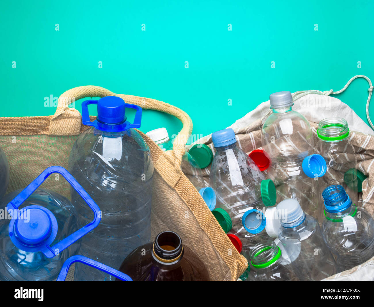 Transparent plastic bottles recycling in eco bag, recycle concept Stock ...