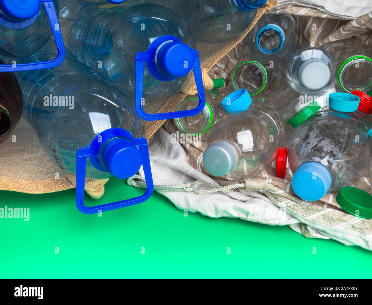 Transparent plastic bottles recycling in eco bag, recycle concept Stock ...