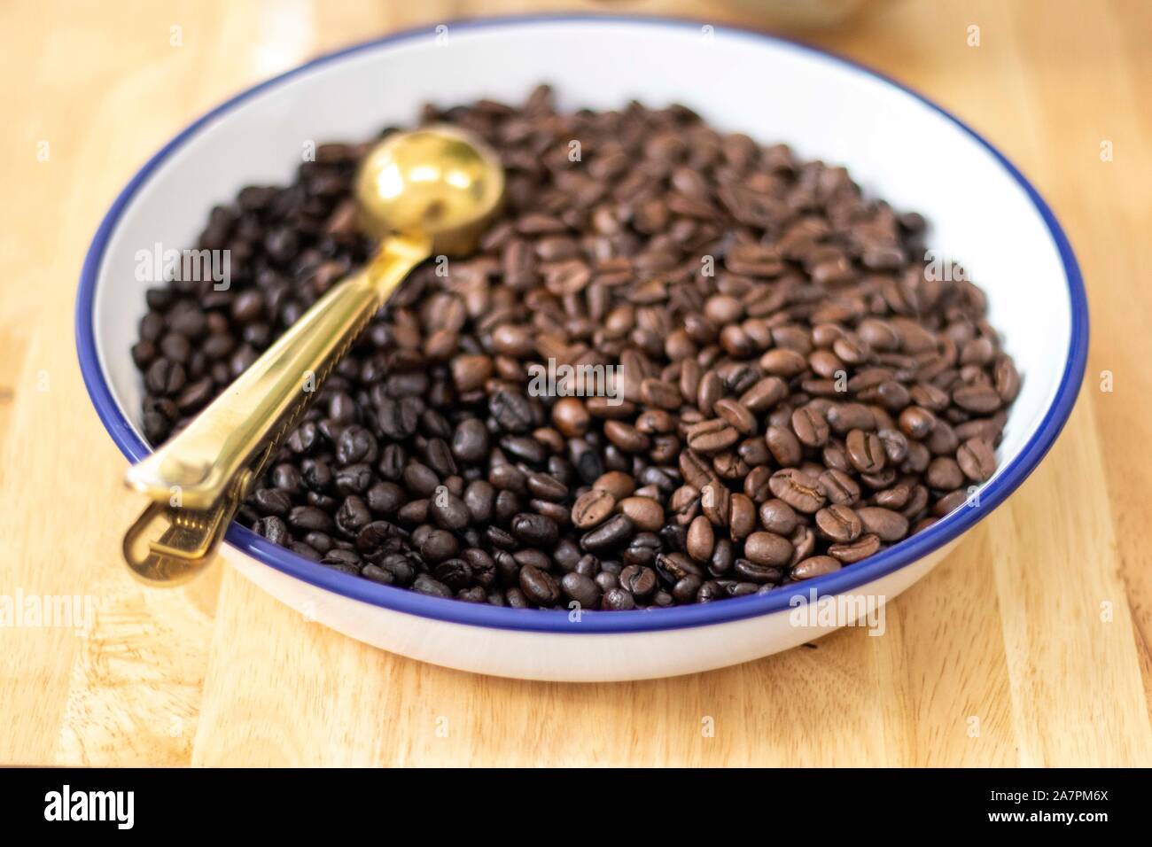 Dark roasted coffee beans Stock Photo - Alamy