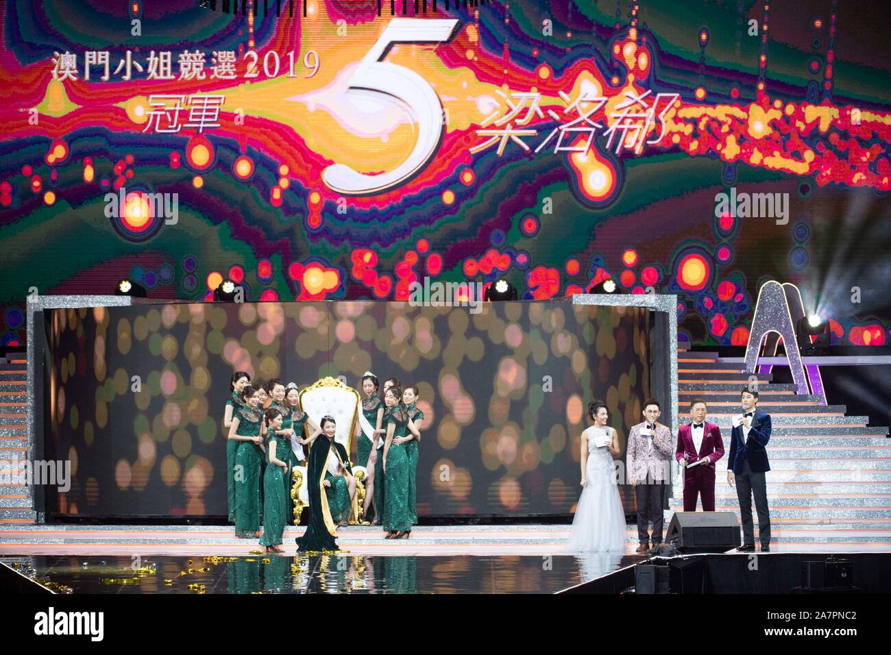 Contestants pose during the 2019 Miss Macau Pageant contest in Macau ...
