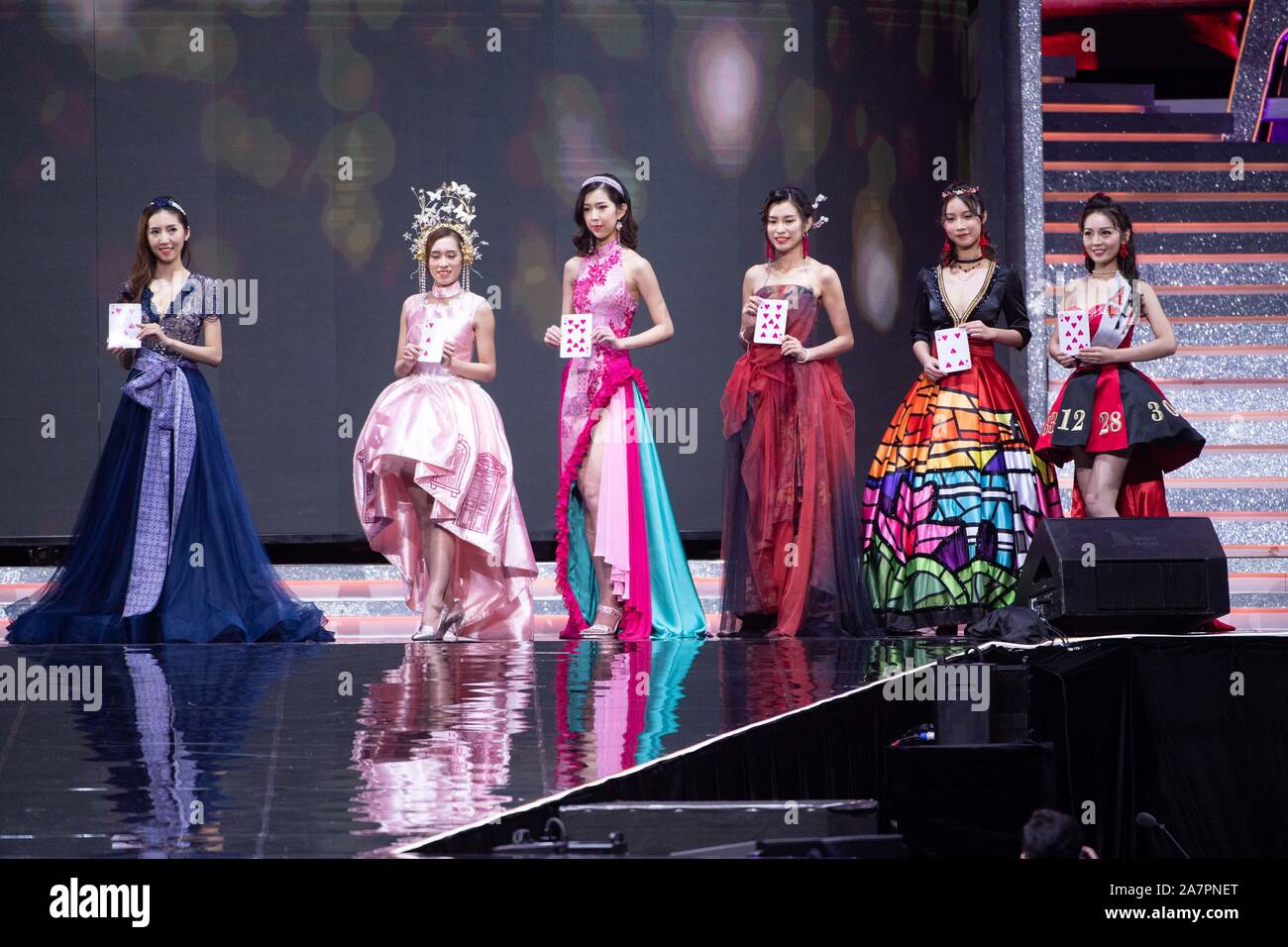 Contestants pose during the 2019 Miss Macau Pageant contest in Macau ...