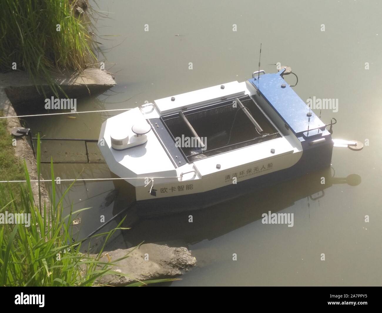 A remote-controlled unmanned vessel able to collect garbage from water ...
