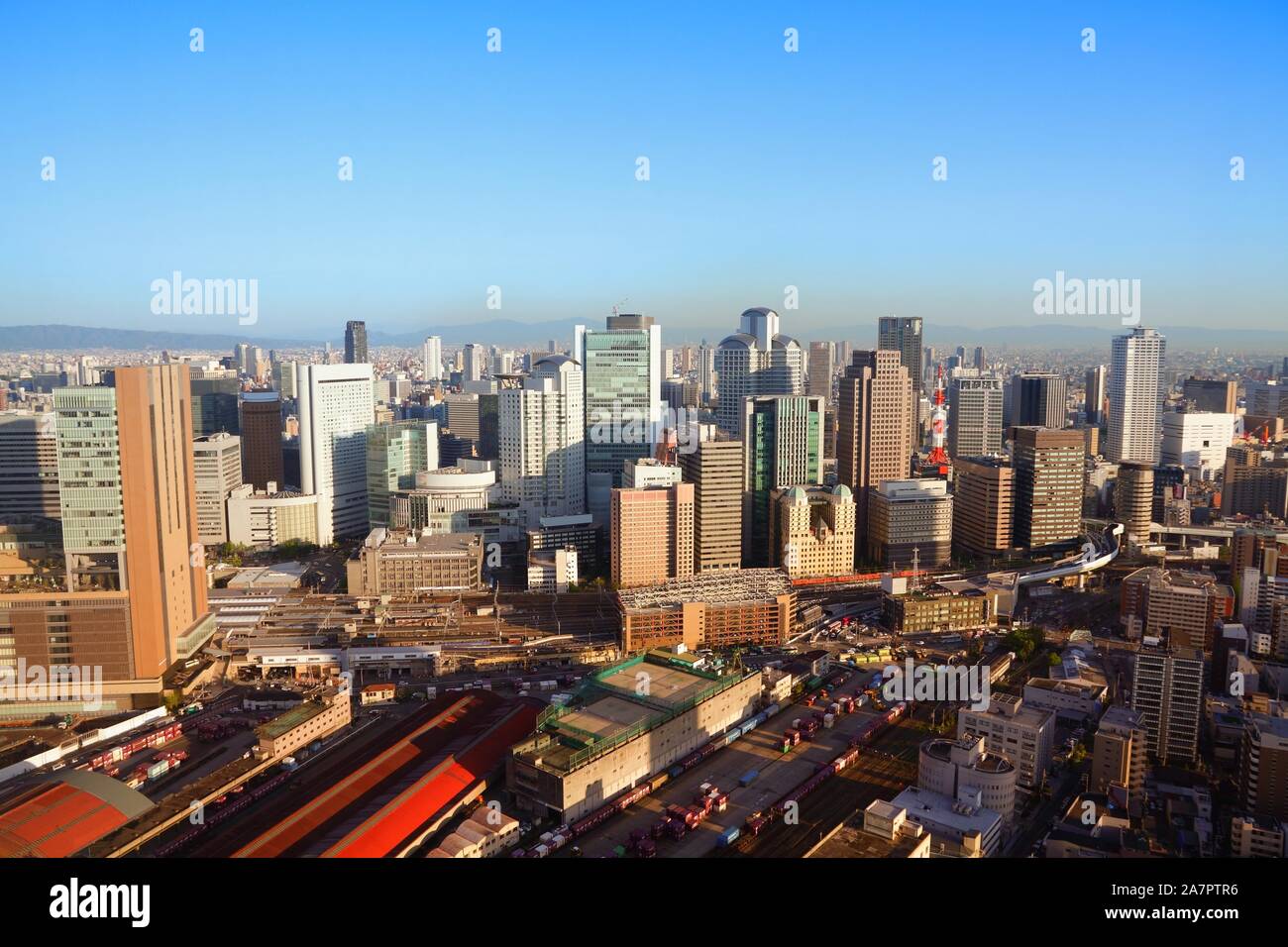 Osaka, Japan - skyline of famous city in the region Kansai. Modern ...