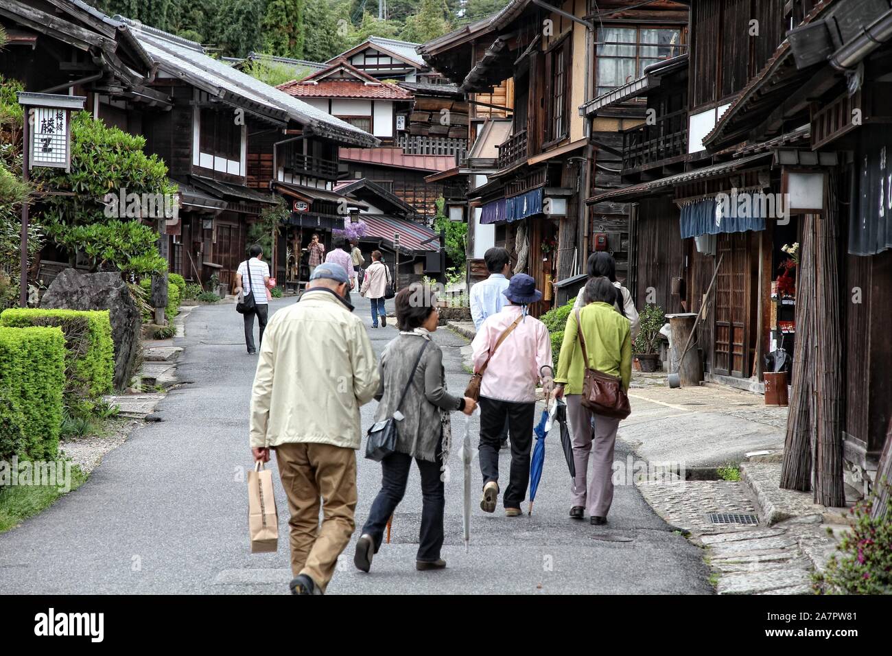 TSUMAGO, JAPAN - MAY 2, 2012: People visit old town of Tsumago. Tsumago ...