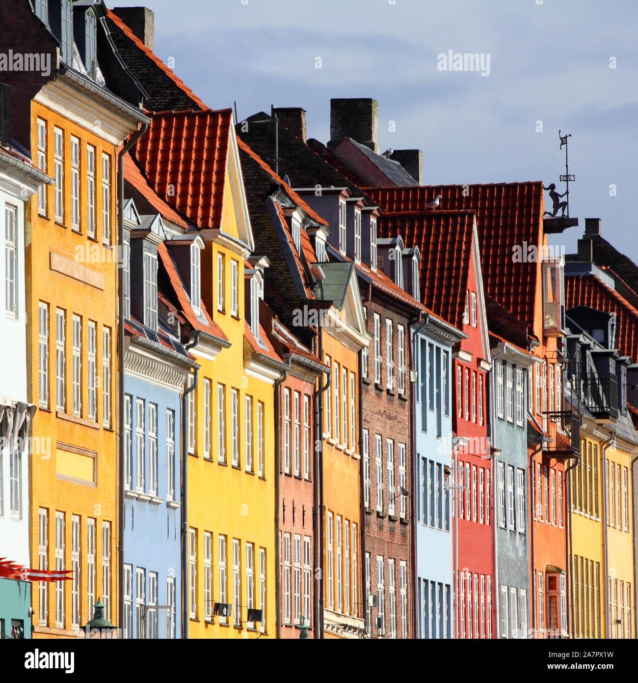 Copenhagen, Denmark - colorful buildings of Nyhavn street. Oresund ...