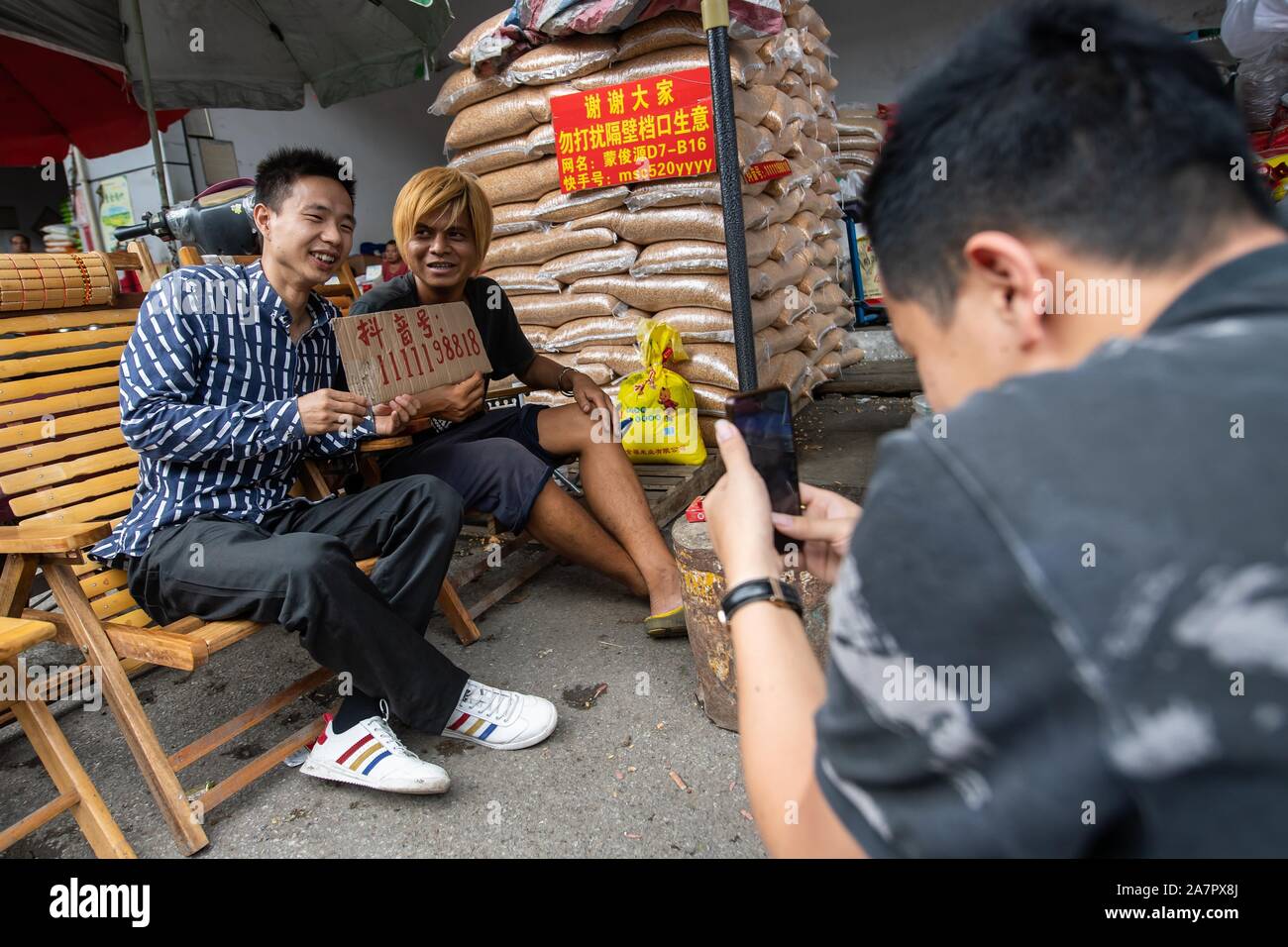 Visitors hearing about Meng Junyuan, who goes viral in social media ...