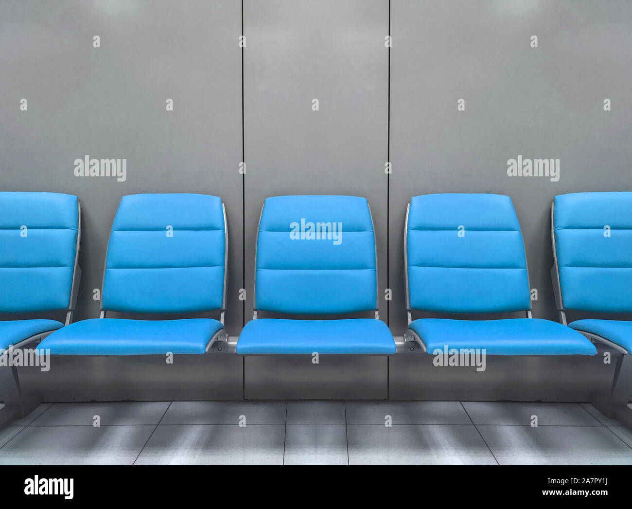blue seat row of waiting for boarding at the airport background Stock ...