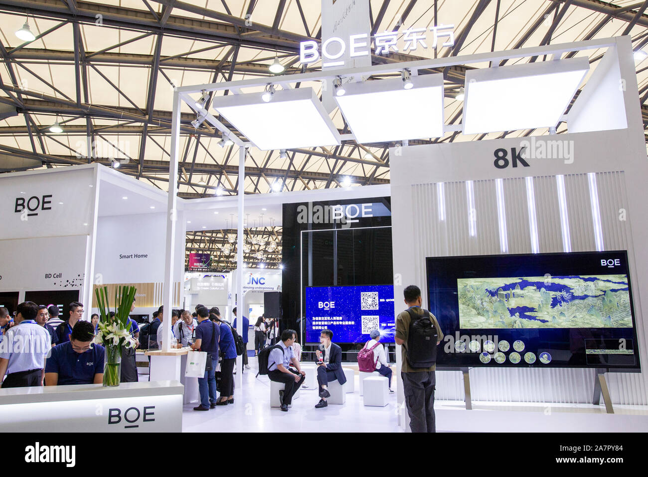 --FILE--People visit the stand of Chinese display panel maker BOE ...