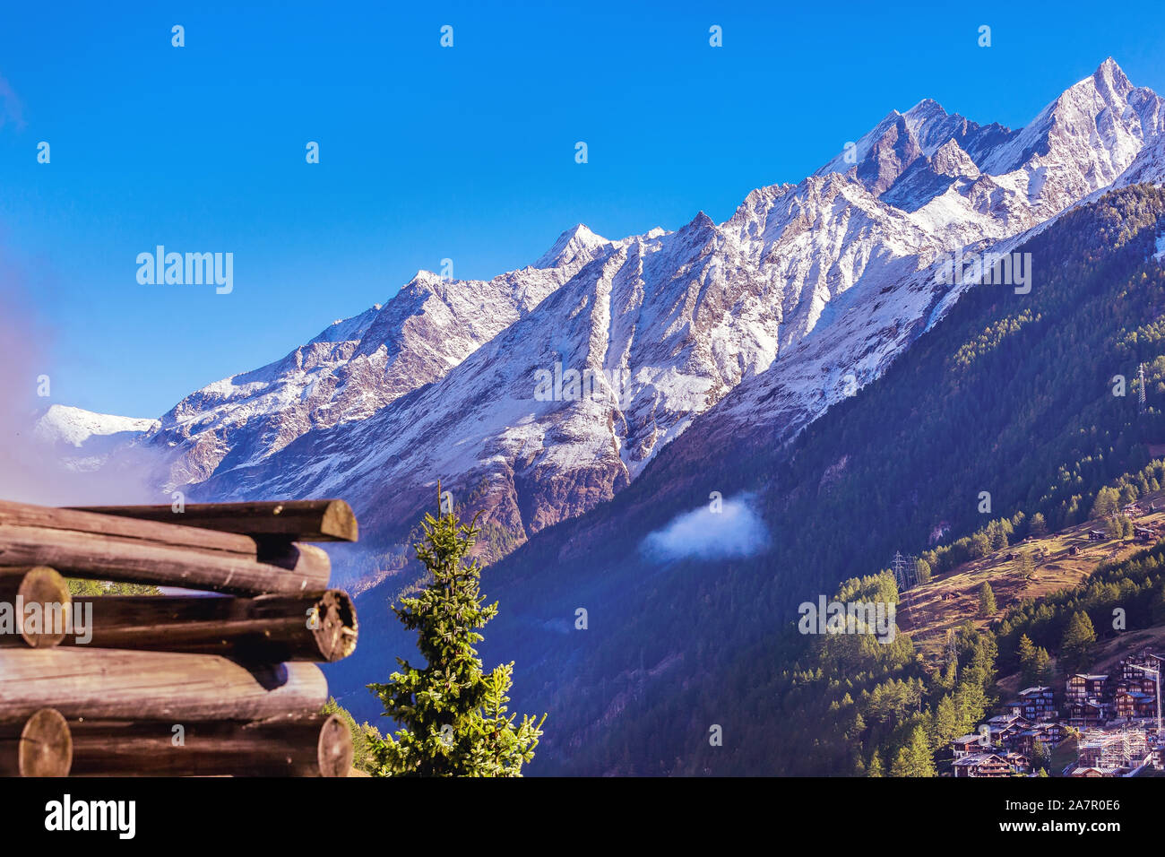 Swiss Alps in Switzerland, wooden balcony and snow peaks in Zermatt ...