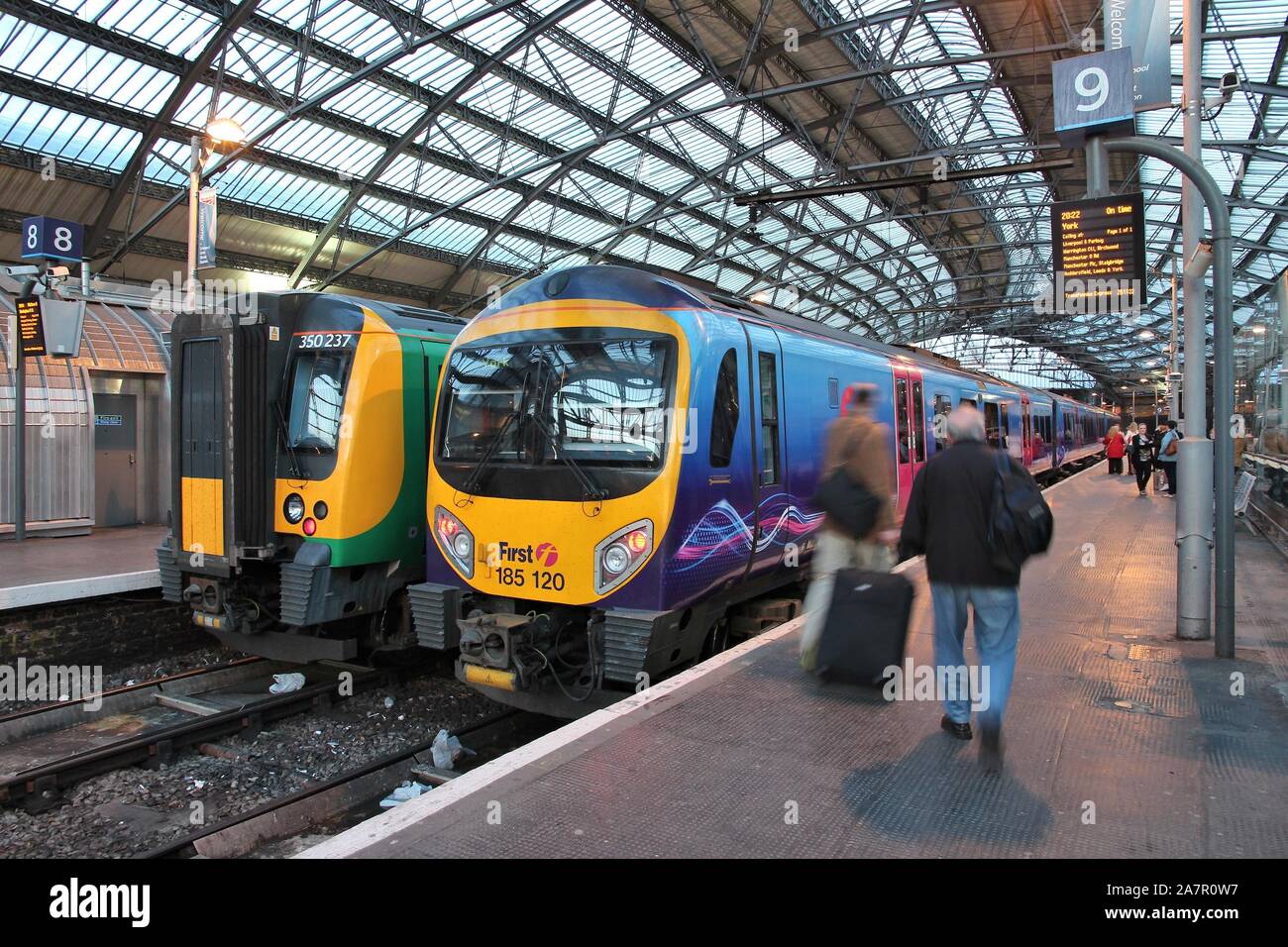 LIVERPOOL, UK - APRIL 20, 2013: Passengers board London Midland and ...