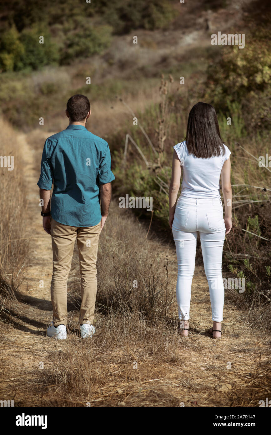 Man standing behind woman hi-res stock photography and images - Alamy