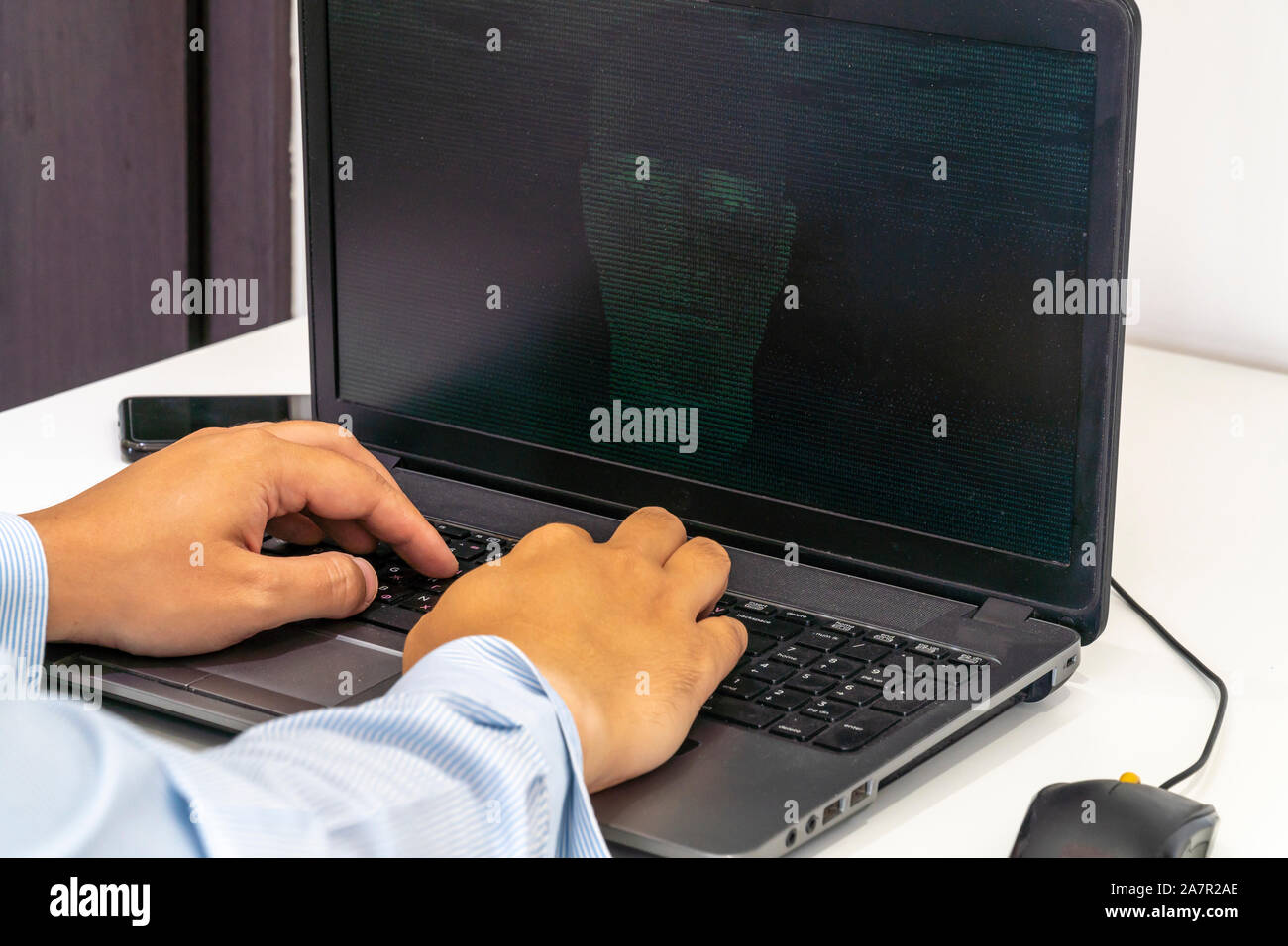 Developer coding on a laptop and creating a artificial intelligence ...