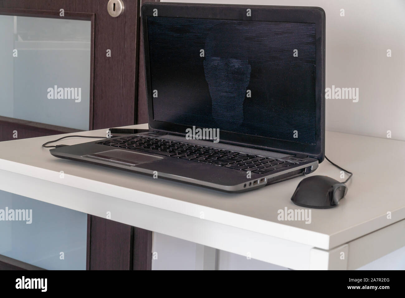 Developer coding on a laptop and creating a artificial intelligence ...