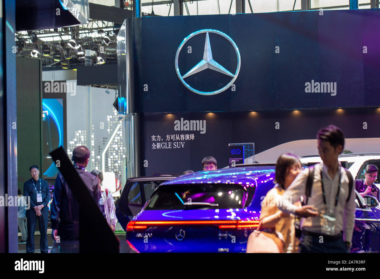 --FILE--People visit the stand of German carmaker Mercedes-Benz during the 2019 International ...