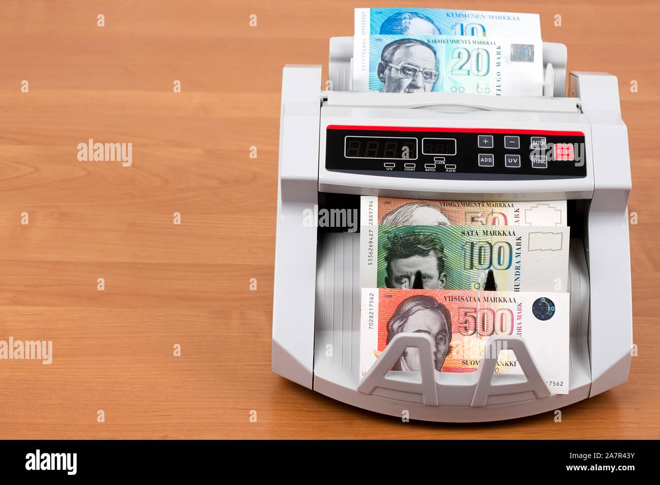 Finnish markka in a counting machine Stock Photo - Alamy