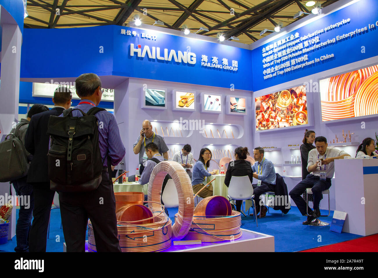 --FILE--People visit the stand of Hailiang Group during an expo in ...