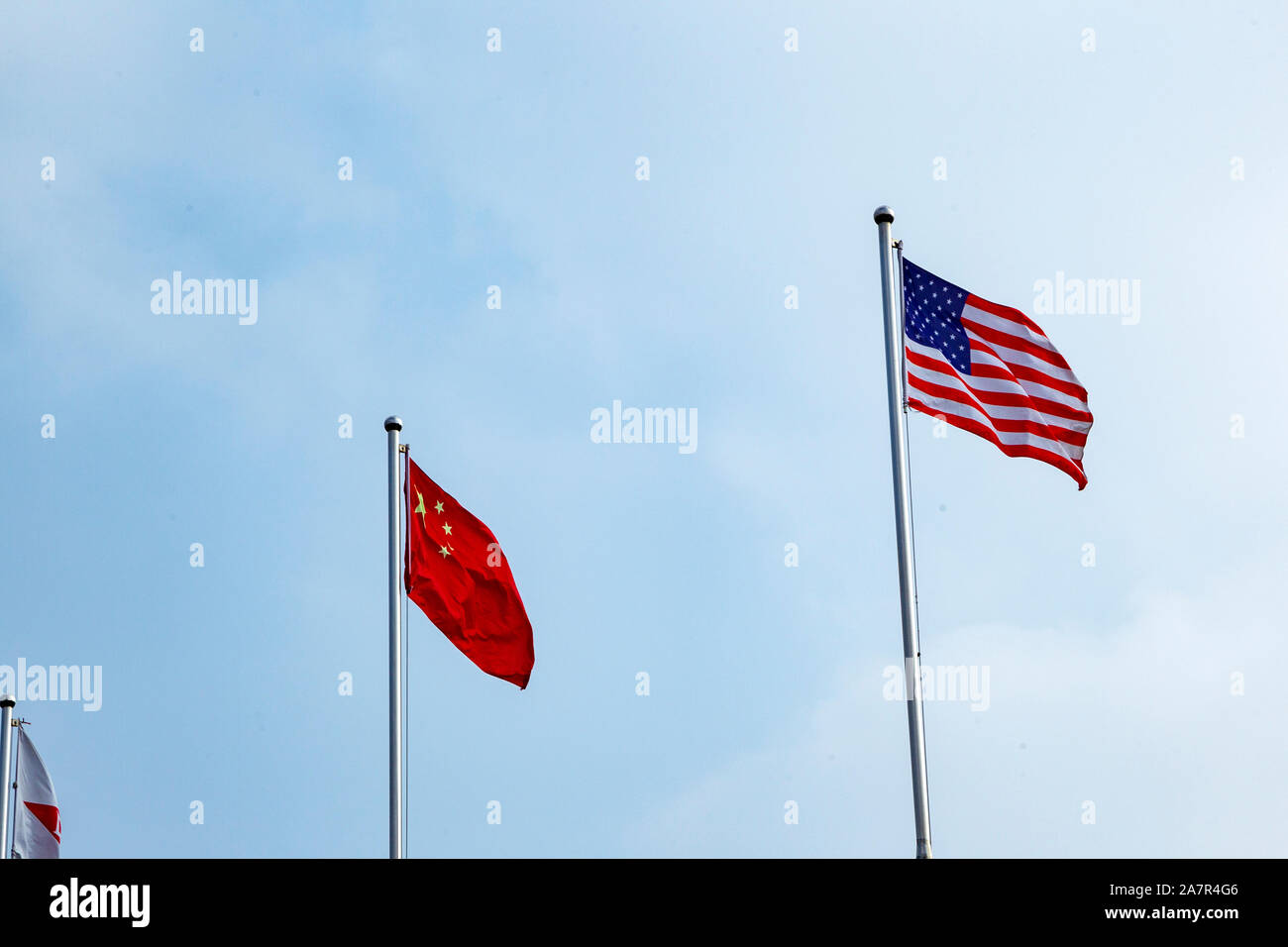 --FILE--National flags of China and the United States flutter in front ...