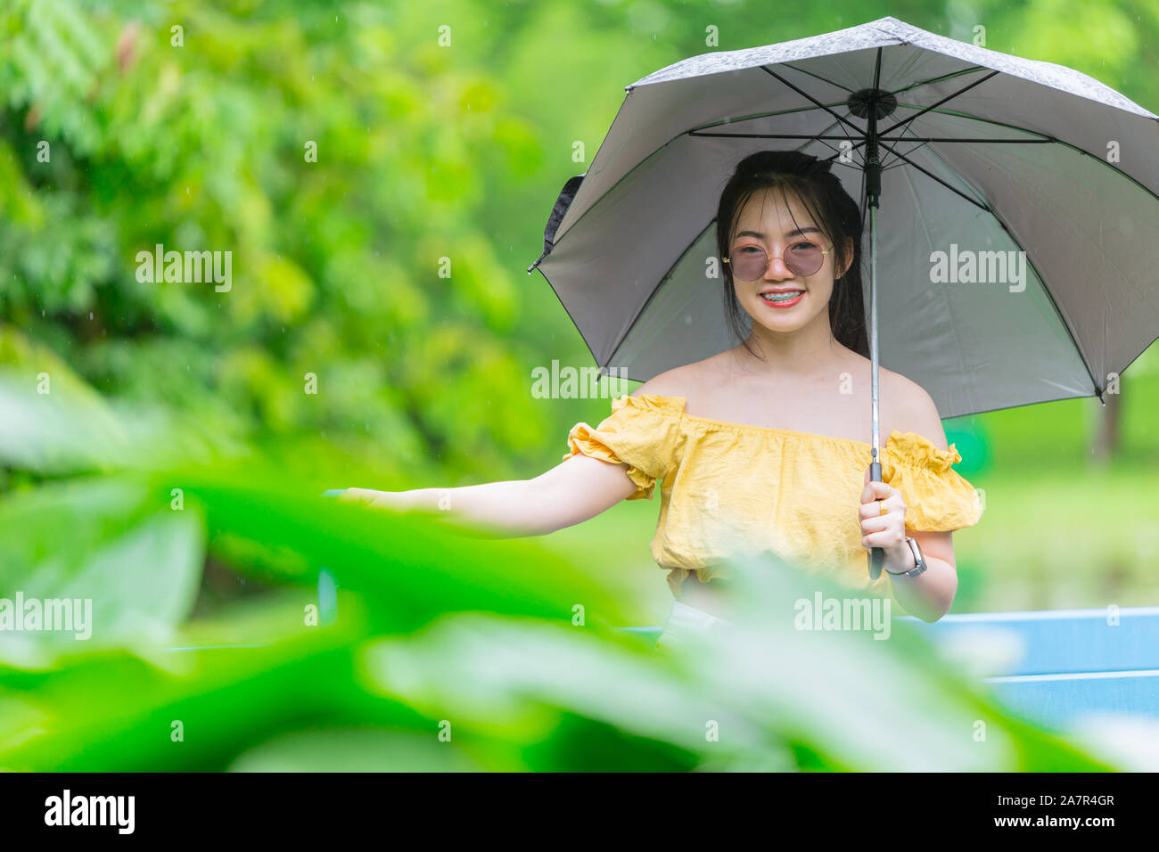Cheerful wet teen girl hi-res stock photography and images - Alamy