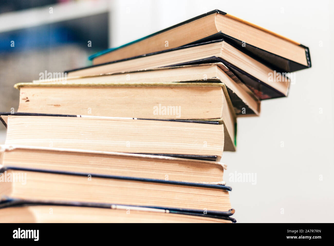 Stack of old book education concept background, many books piles with ...