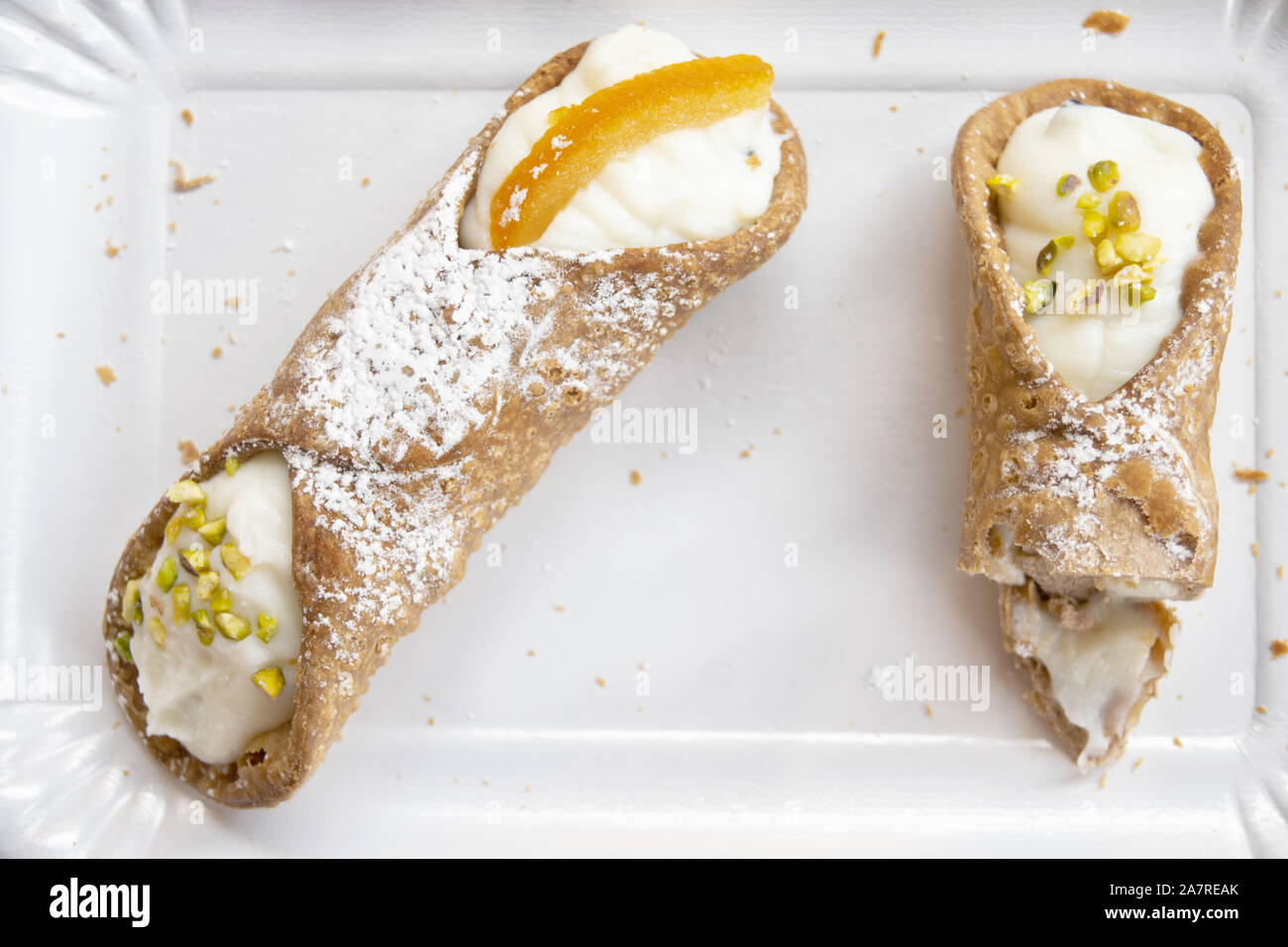 sicilian pastries filled with ricotta cream called cannoli Stock Photo ...