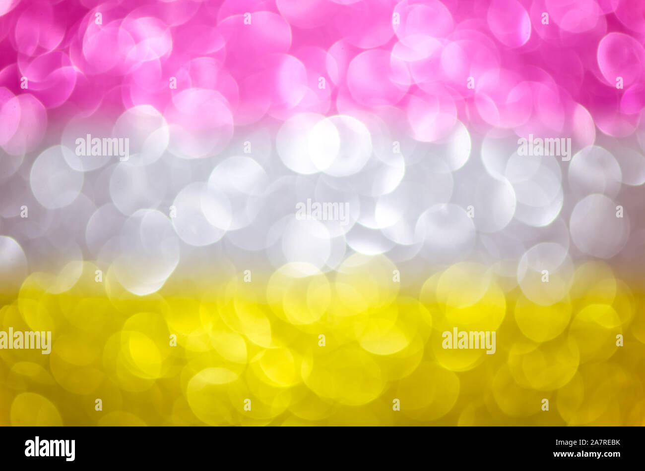 Abstract glitter three color lights background. de-focused. pink ...