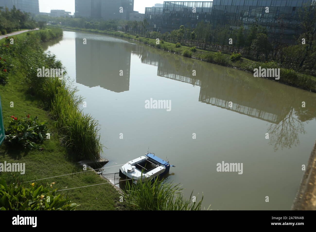 A remote-controlled unmanned vessel able to collect garbage from water ...