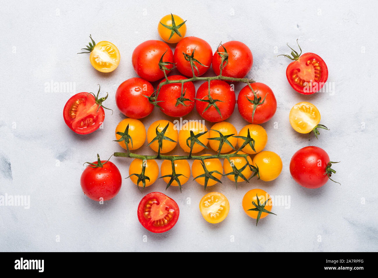 Red yellow tomatoes on table hi-res stock photography and images - Alamy