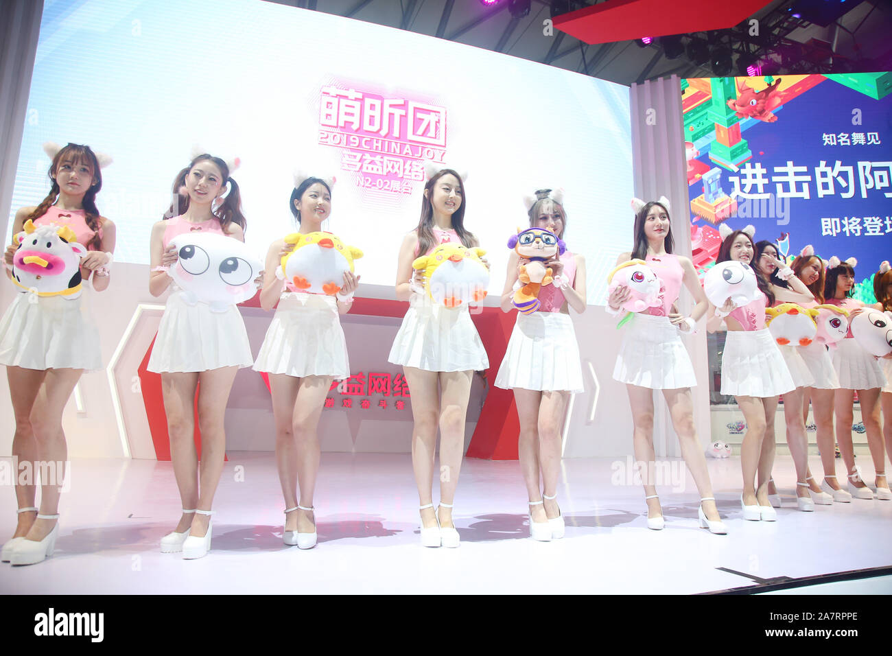 Chinese showgirls pose during the 17th China Digital Entertainment Expo, also known as ChinaJoy ...