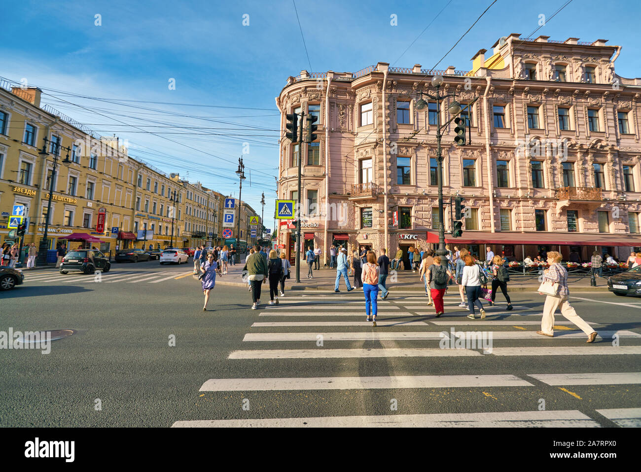 SAINT PETERSBURG, RUSSIA - CIRCA AUGUST, 2017: people crossing the road ...