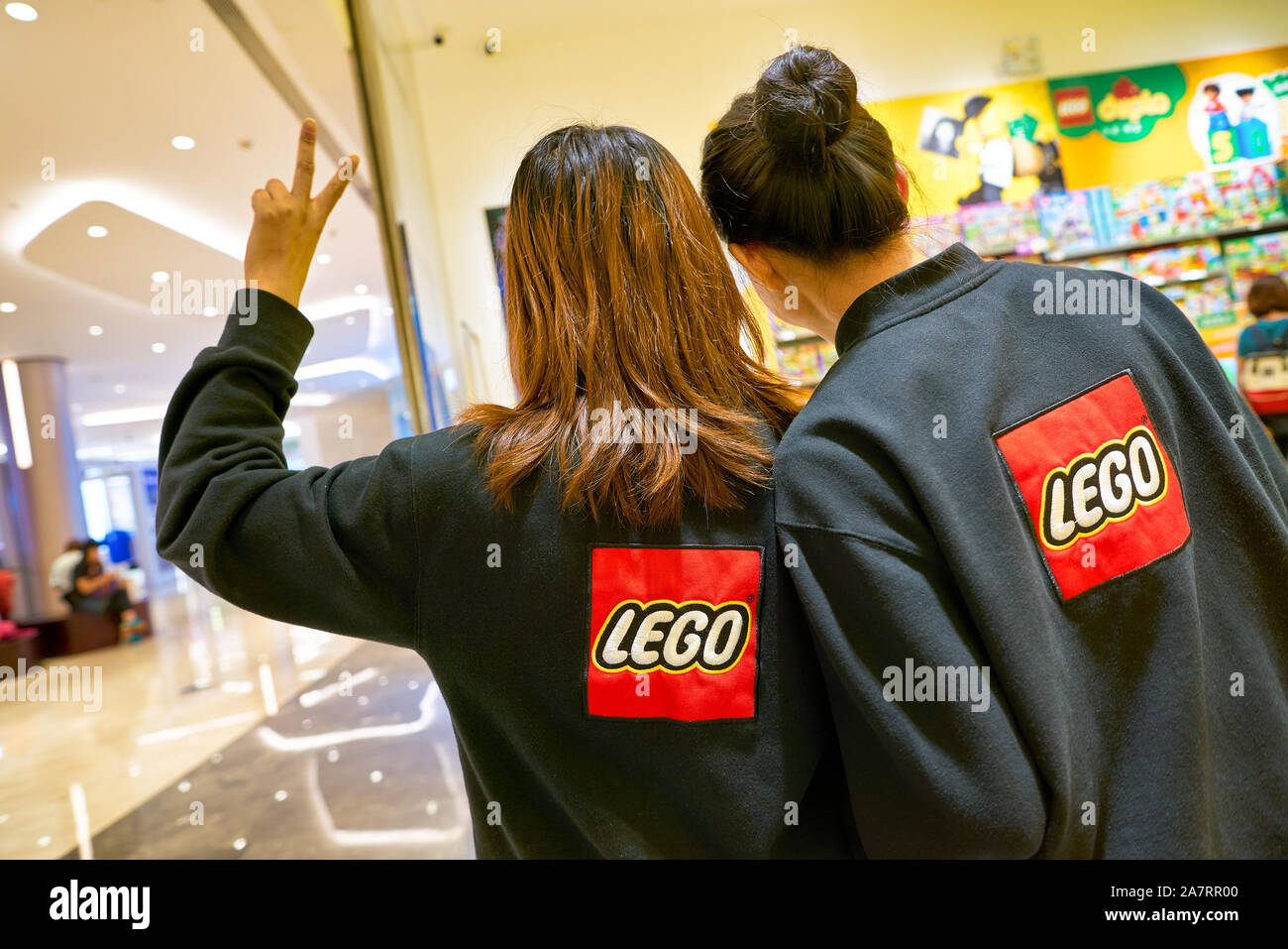SHENZHEN, CHINA - APRIL 19, 2019: Lego sign on staff uniform at Lego ...