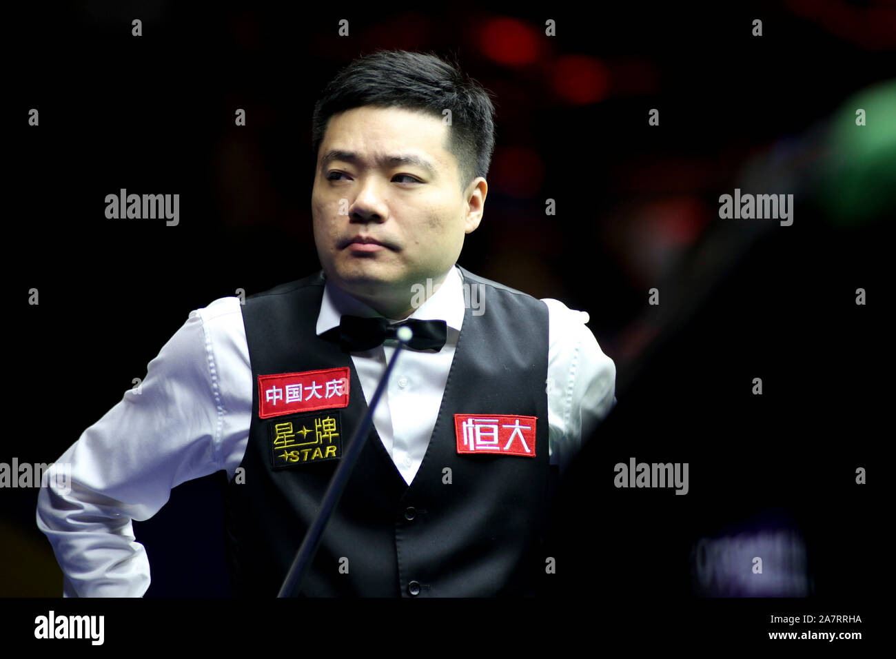 Ding Junhui of China considers a shot to Mark Allen of Northern Ireland ...