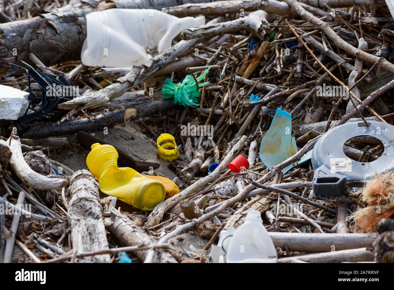 Plastic waste styrofoam bags nets and bottles on ocean shore ...