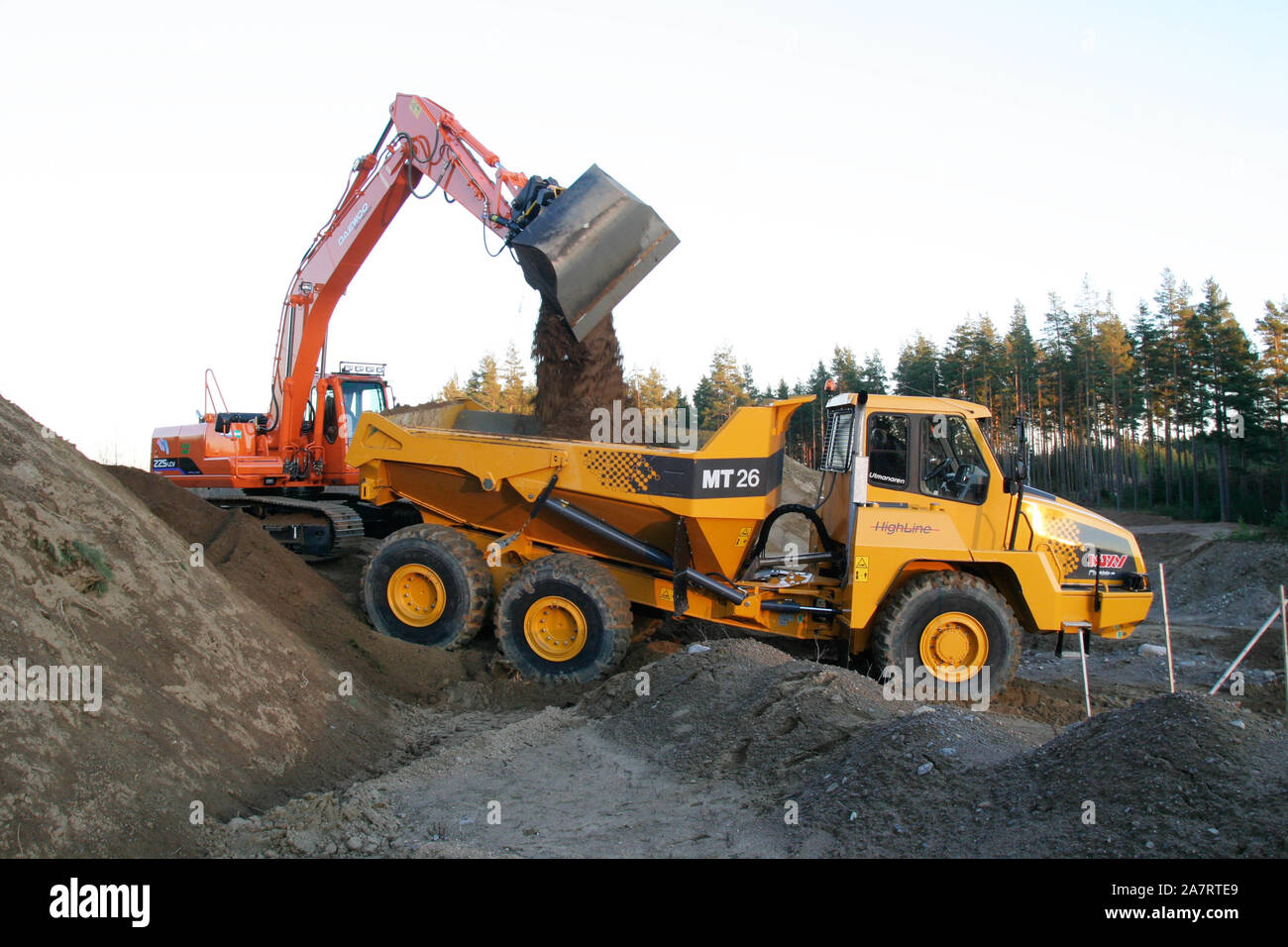 An excavator and a dump truck on a sand roof.Photo Jeppe Gustafsson ...