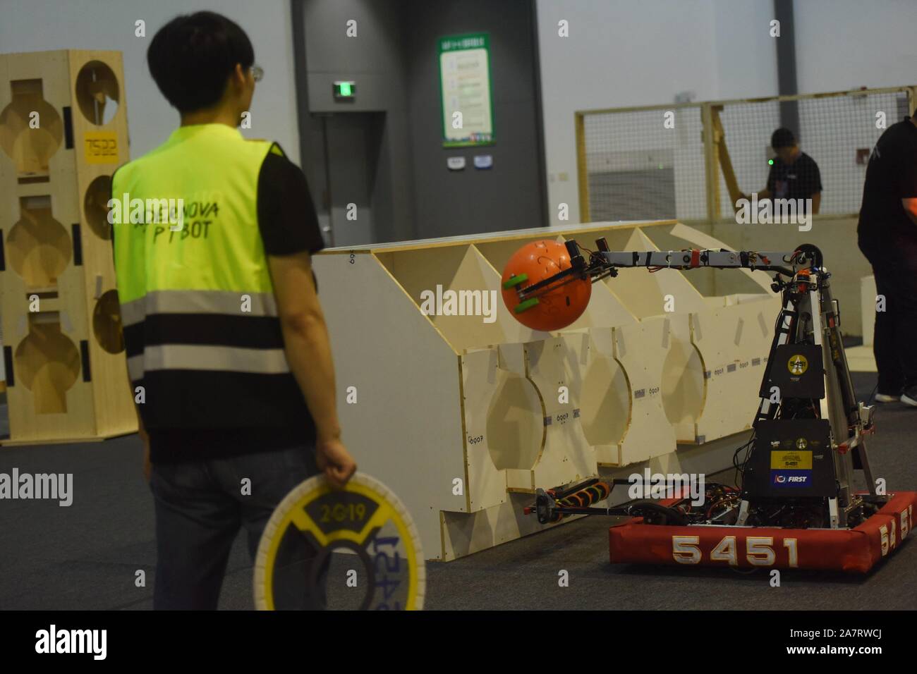 Participants test their robots before competition at the second ...