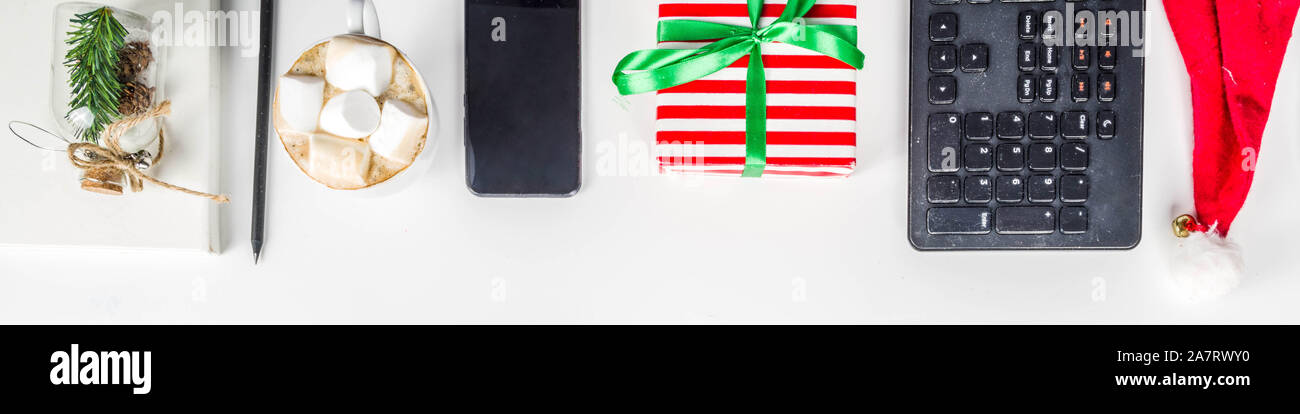 Office secret santa concept with Office table surface, keyboard, mouse ...