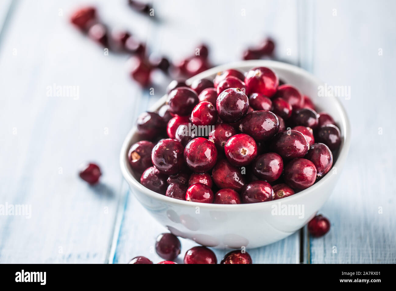 Fresh ripe cranberries in bowl on table close-up Stock Photo - Alamy
