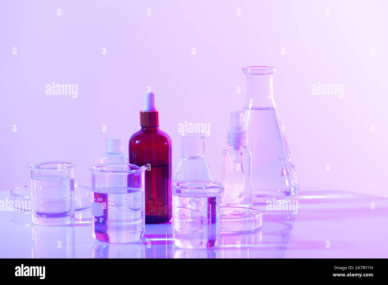 flask of water olution in science laboratory background Stock Photo - Alamy