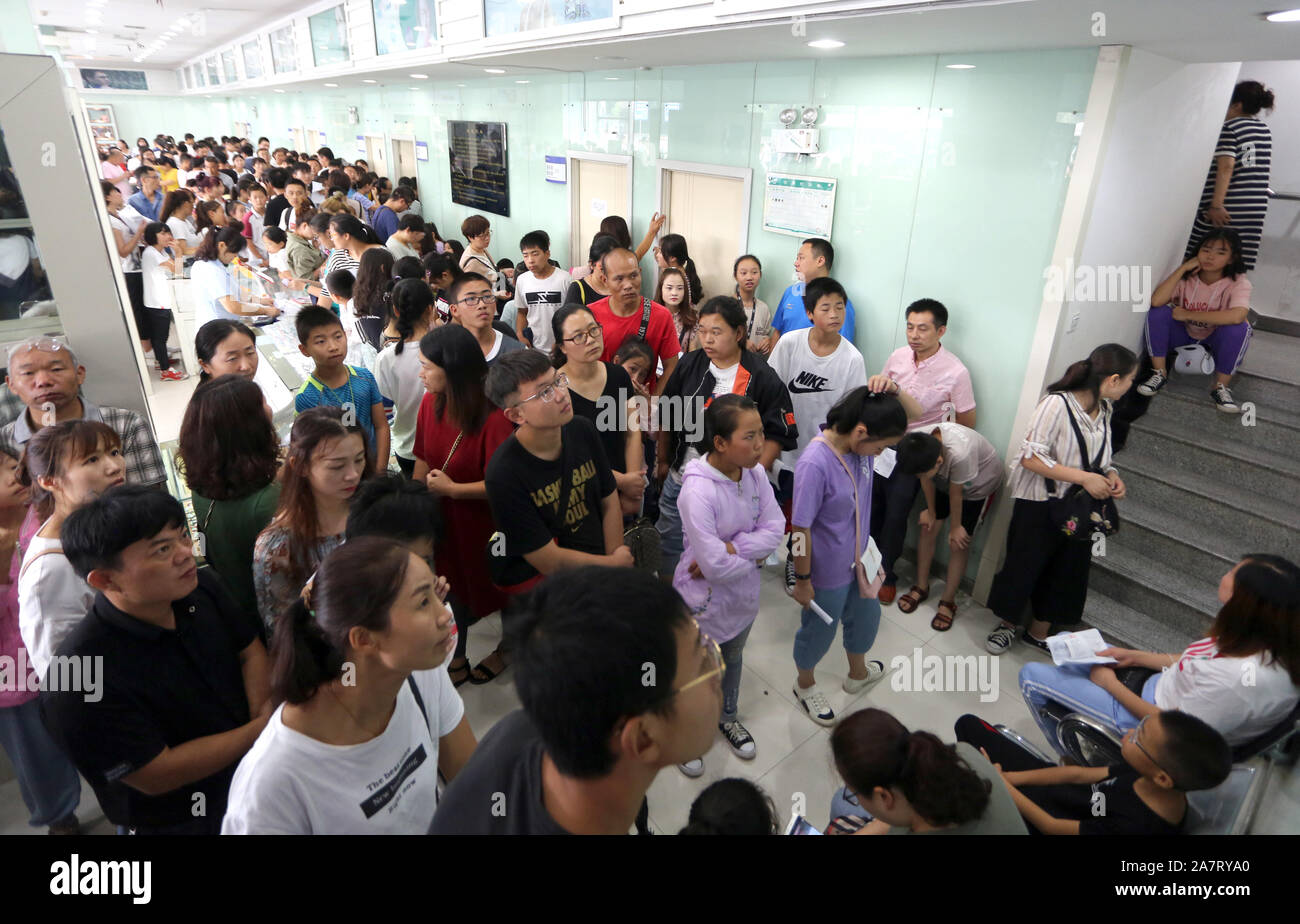 Chinese students flock to a hospital for eye prescriptions before ...